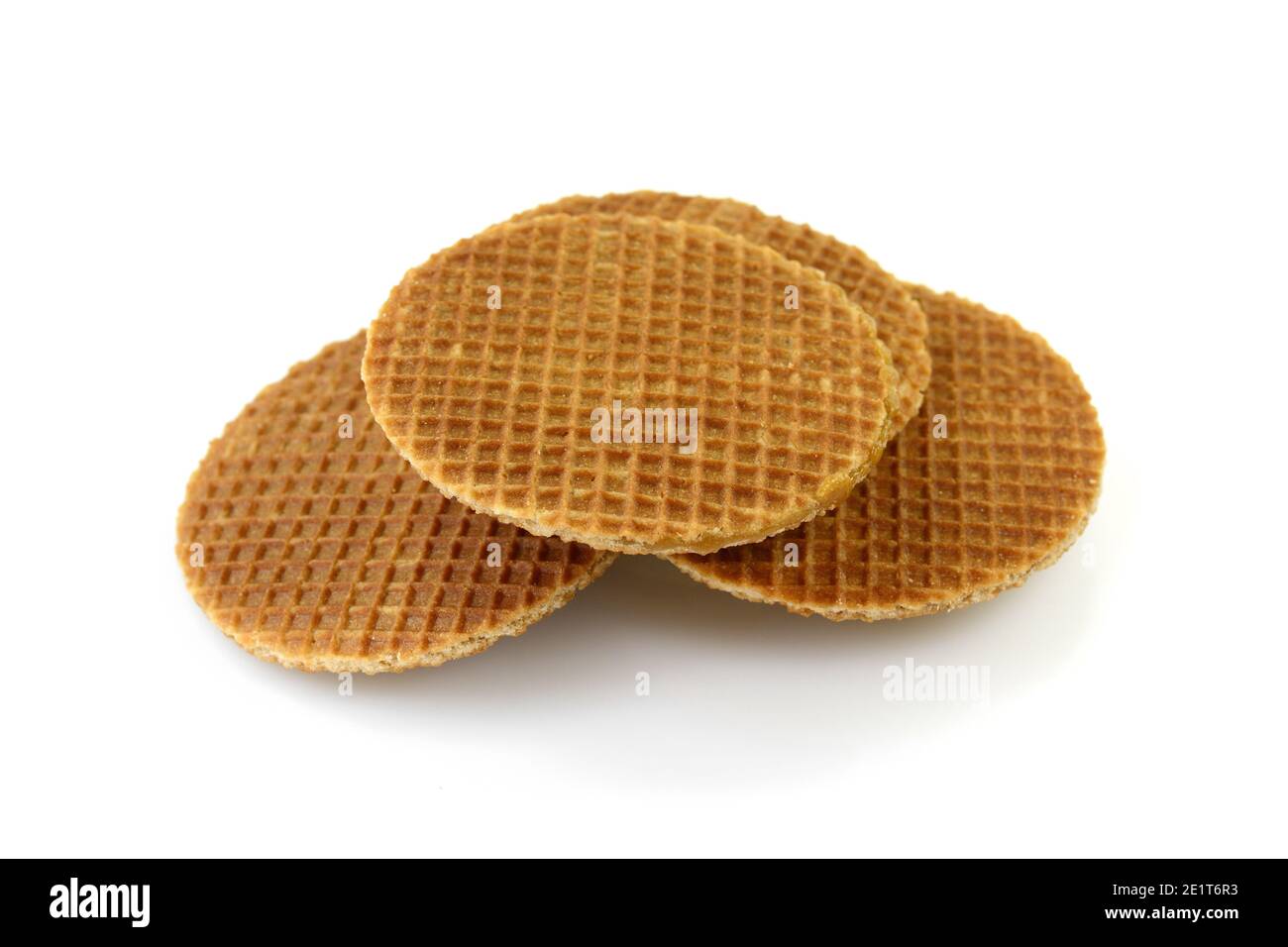 Stack of Dutch stroopwafel cookies or caramel waffles isolated on white ...