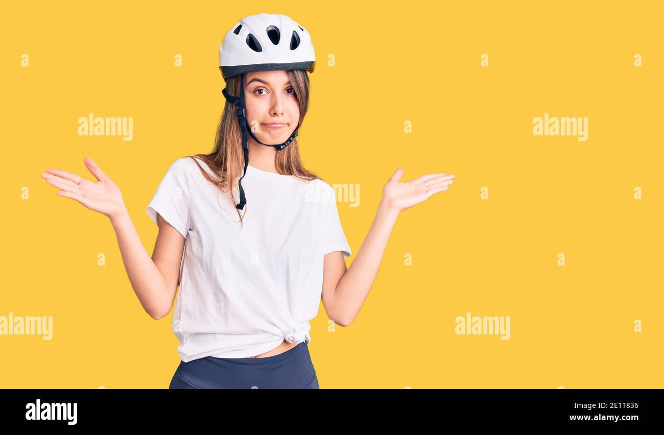Confused female cyclist hi-res stock photography and images - Alamy
