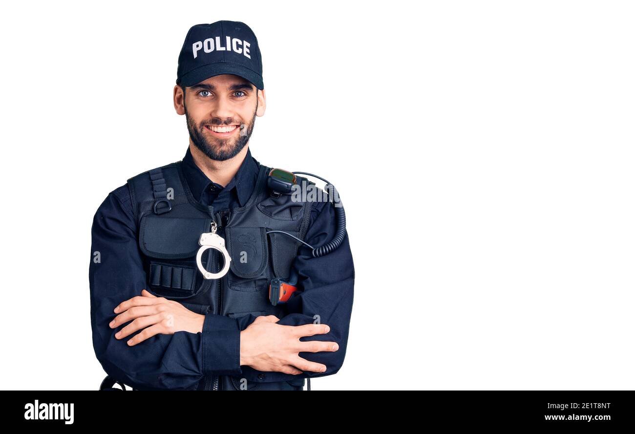 Friendly male police officer looking hi-res stock photography and ...