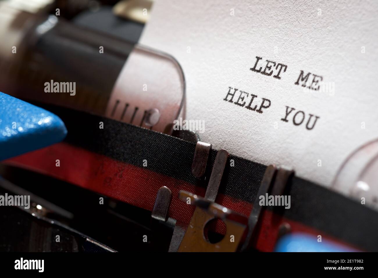 Let me help you phrase written with a typewriter Stock Photo - Alamy