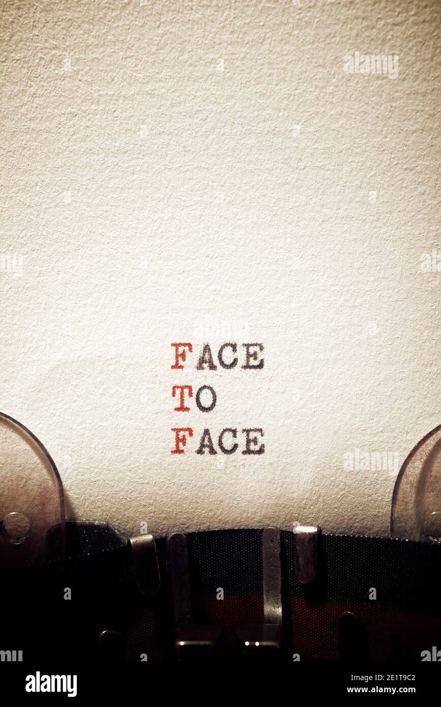 Face to face phrase written with a typewriter Stock Photo - Alamy