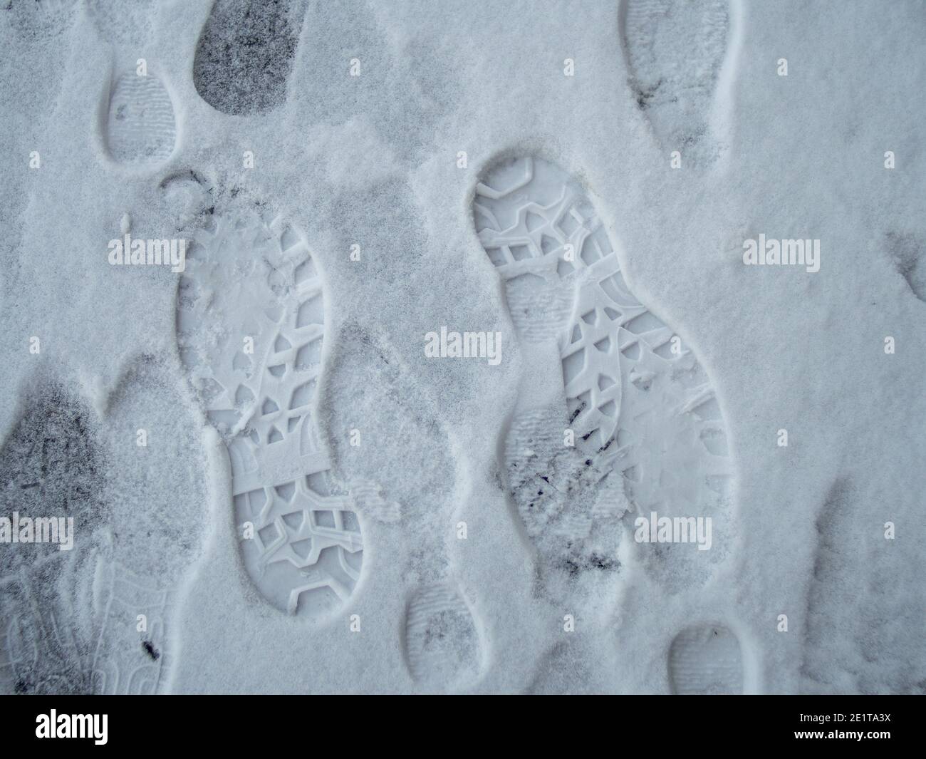 Snowy path with human footprints hi-res stock photography and images ...