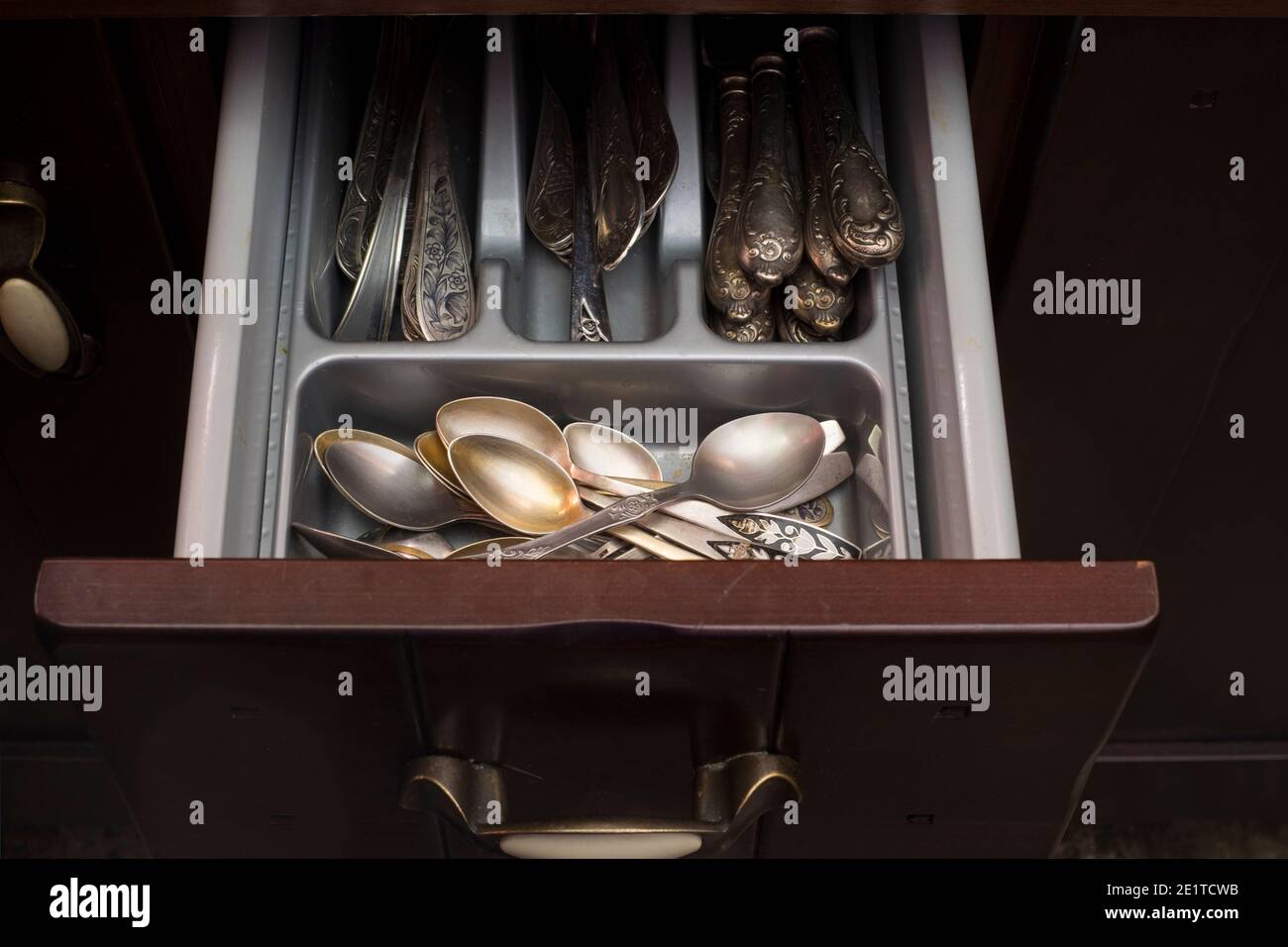 Clean silverware in a kitchen drawer, indoor close up Stock Photo - Alamy