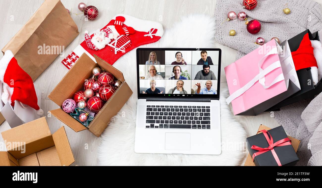 A happy family with a child is celebrating Christmas with their friends ...