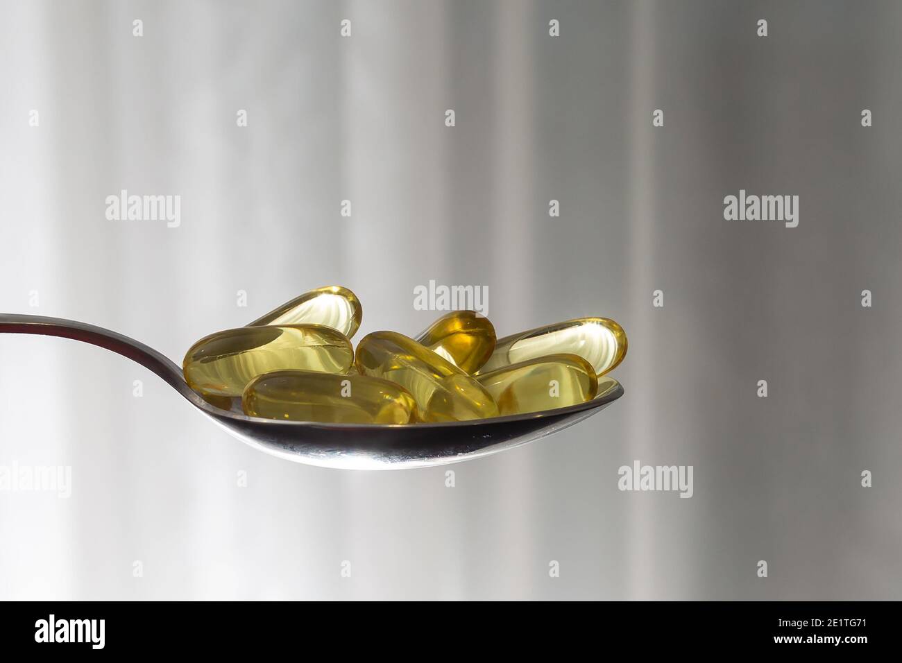 Vitamin D capsules tablets omega 3 healthy diet concept Stock Photo - Alamy