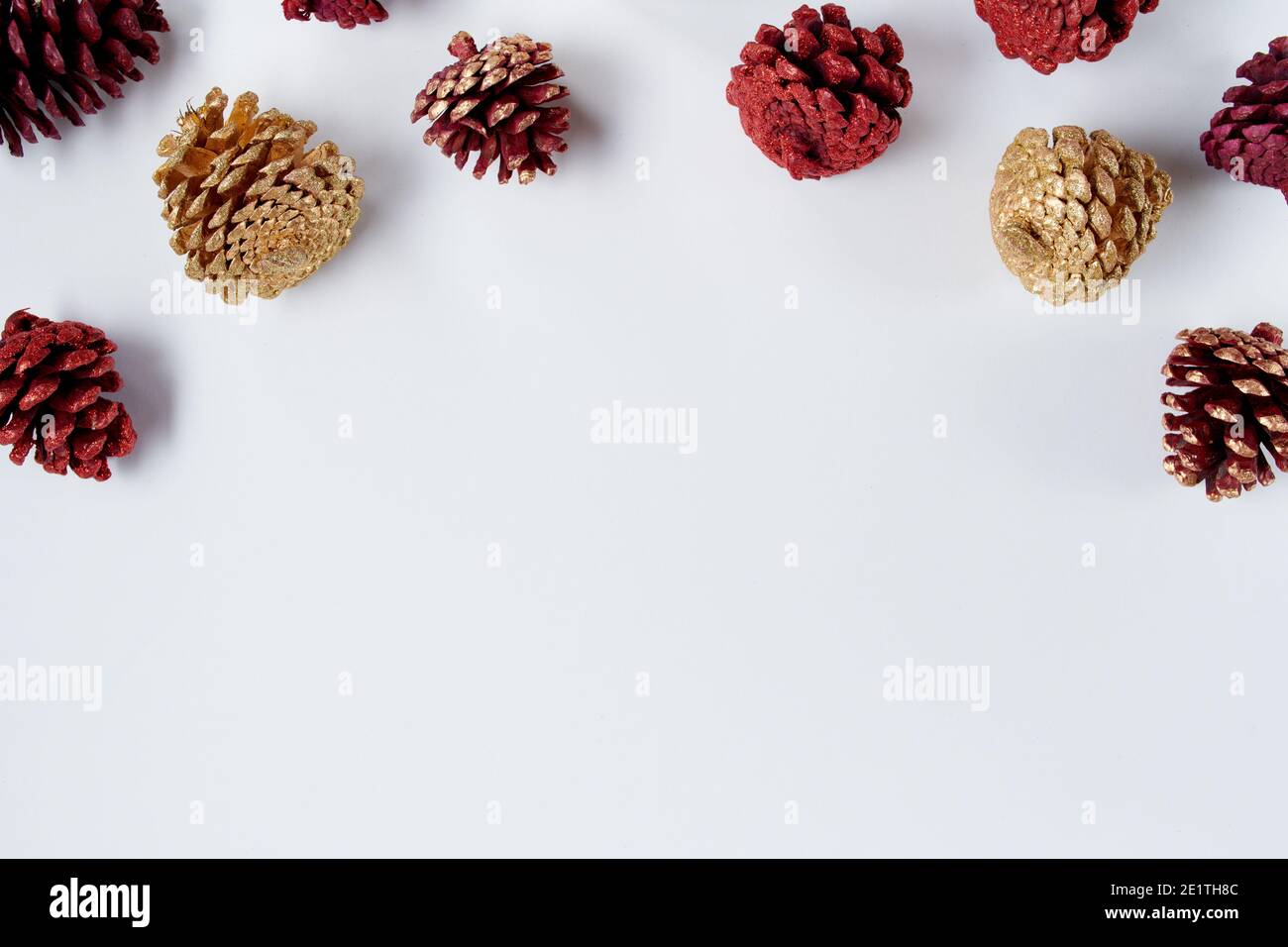 winter flat lay with conifer cones on white background Stock Photo - Alamy