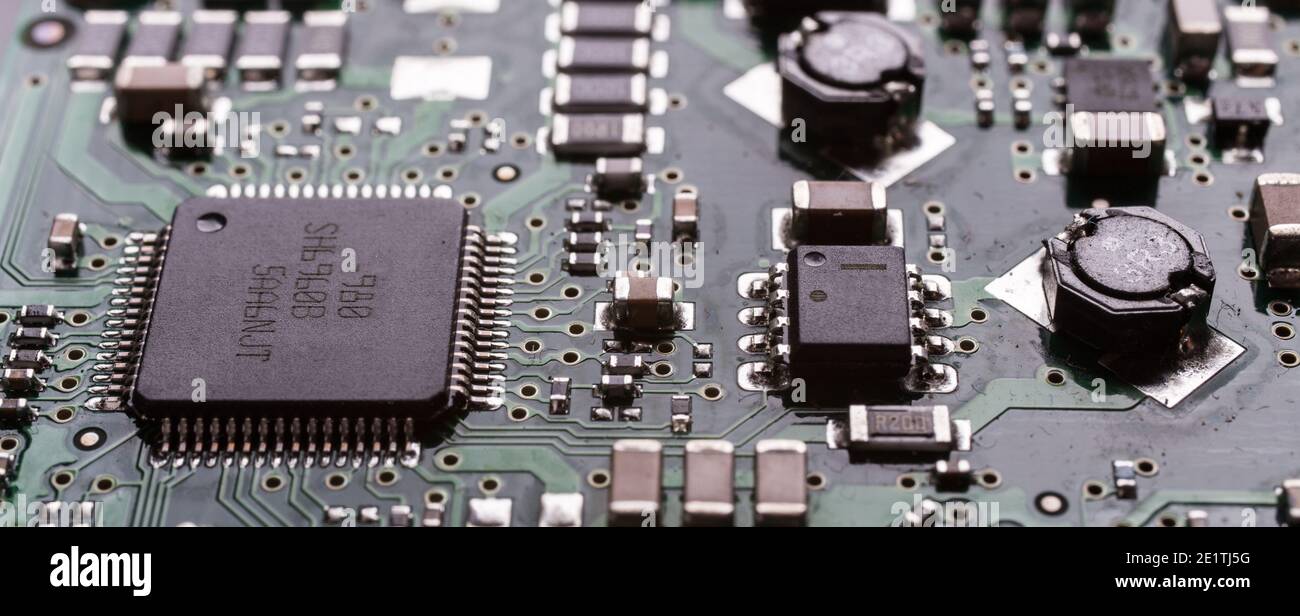 Computer circuits hardware close up. Motherboard parts, chips ...