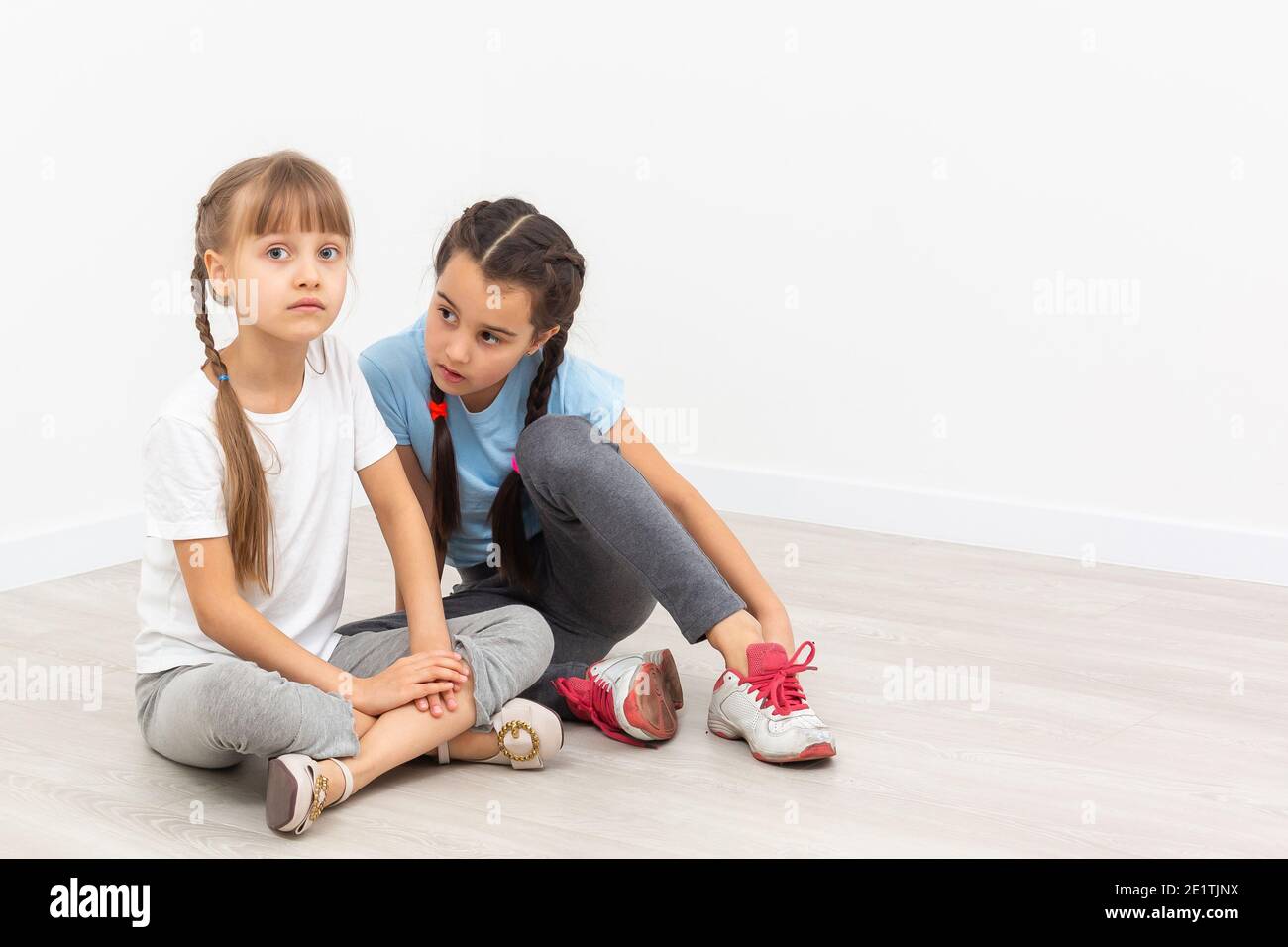 twins girls are sad, lonely and moody. Children are alone, sad and ...