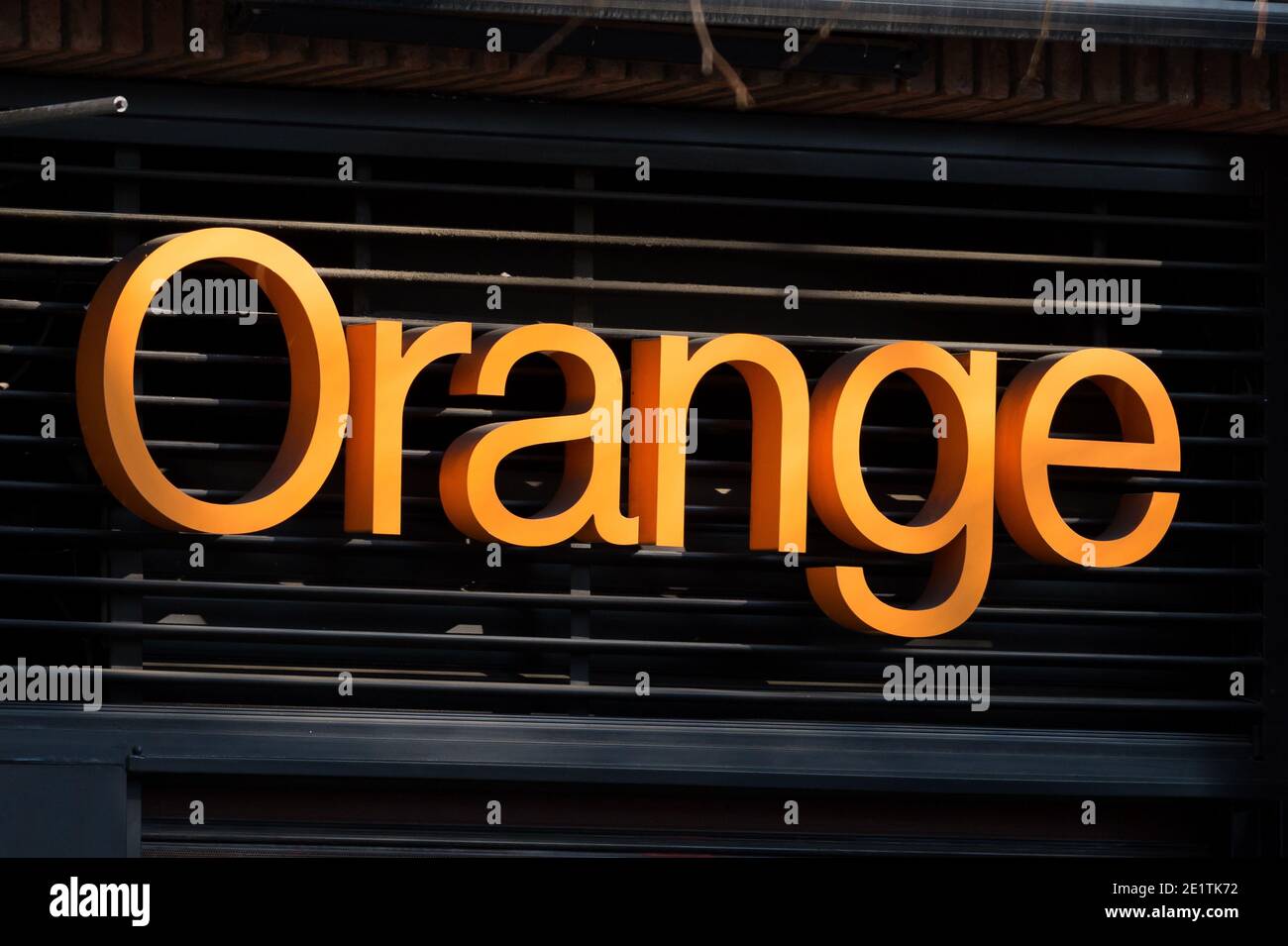 A close-up of an Orange mobile phone network provider logo in Barcelona ...