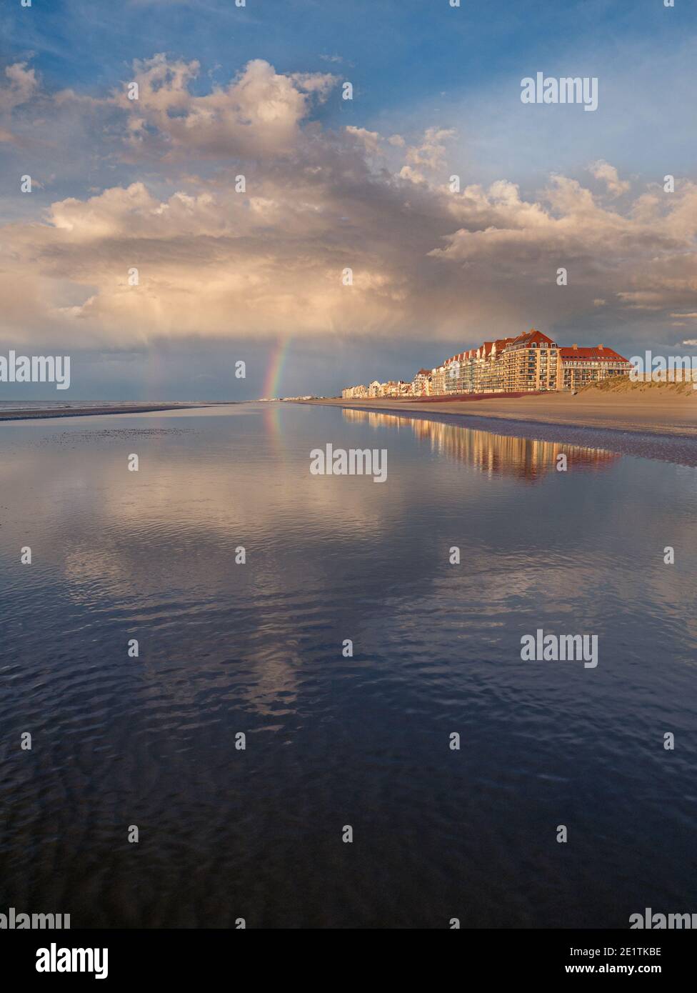 Colorful scenery at the beach with rainbow Stock Photo - Alamy