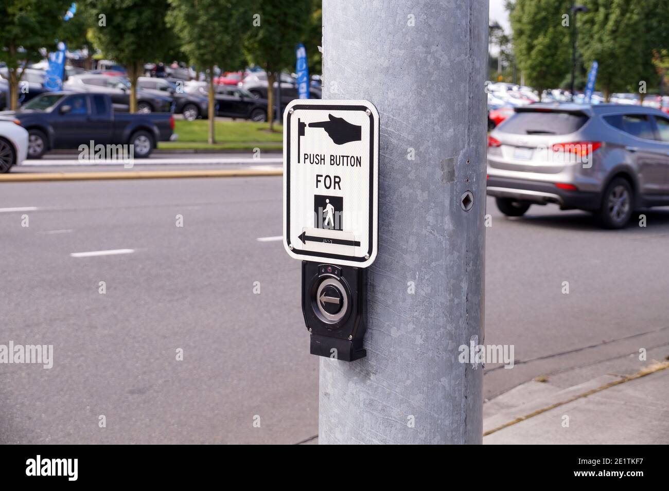 A steel pole with a switch for pedestrians. Crossroads Stock Photo - Alamy