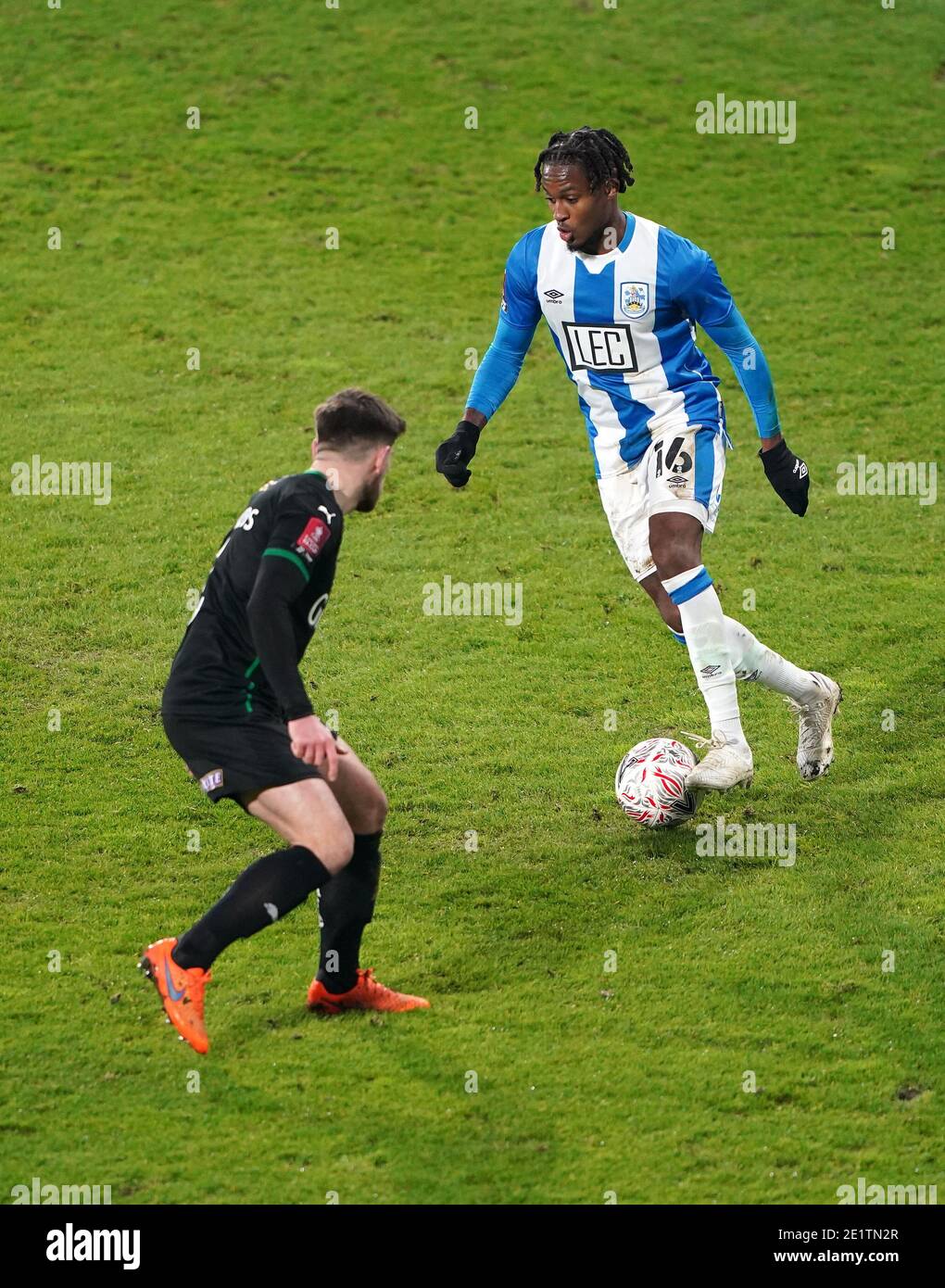 Huddersfield Town's Rolando Aarons (right) and Plymouth Argyle's Joe ...