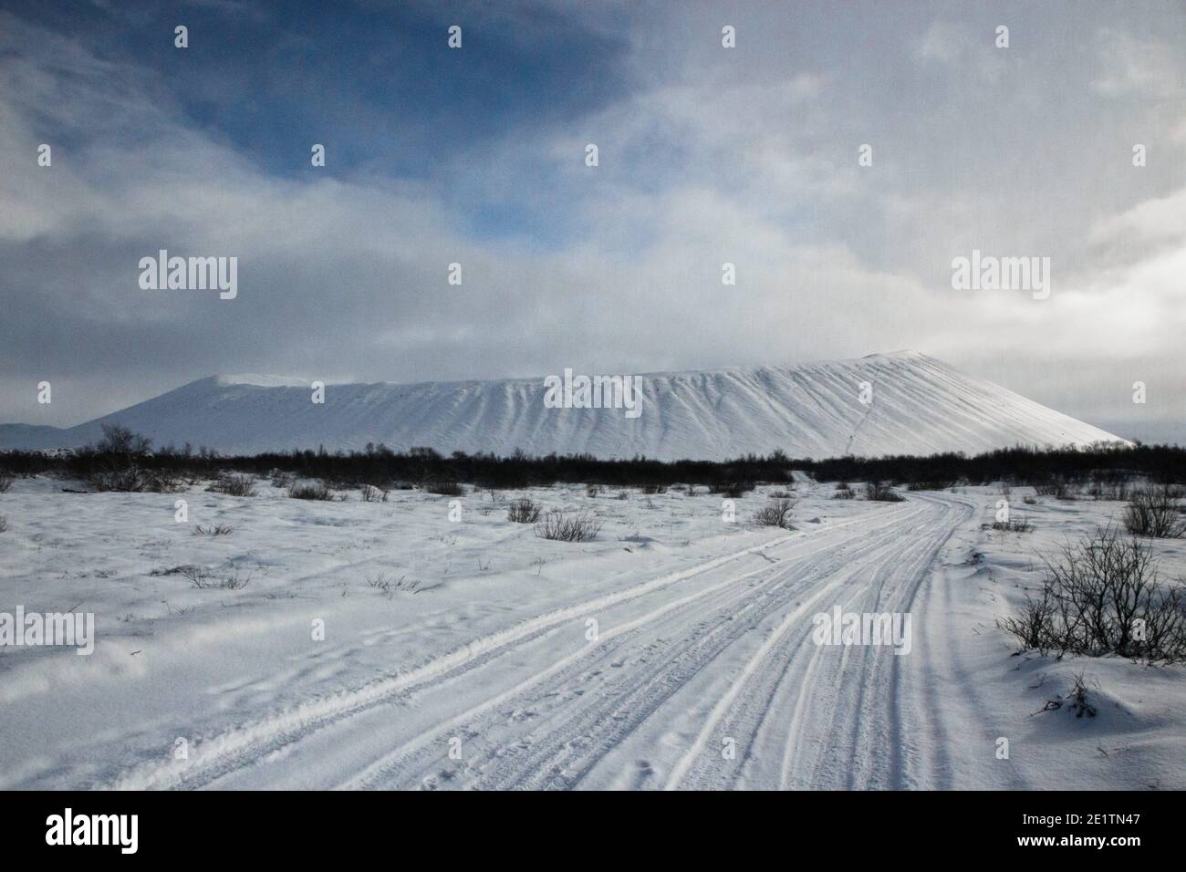 Panorama snowy winter landscape view of huge volcano cone crater ...