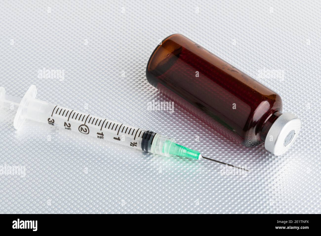 A close-up shot of a hygienic single-use plastic disposable medicine ...