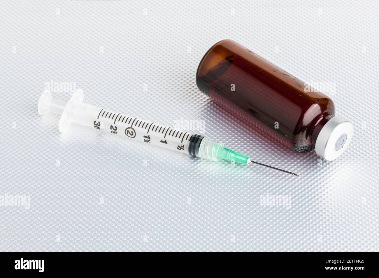 A close-up shot of a hygienic single-use plastic disposable medicine ...