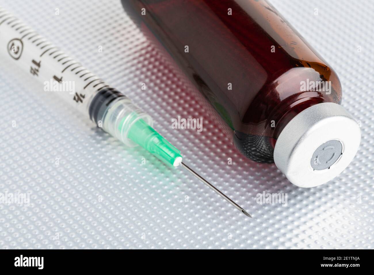 A close-up shot of a hygienic single-use plastic disposable medicine ...