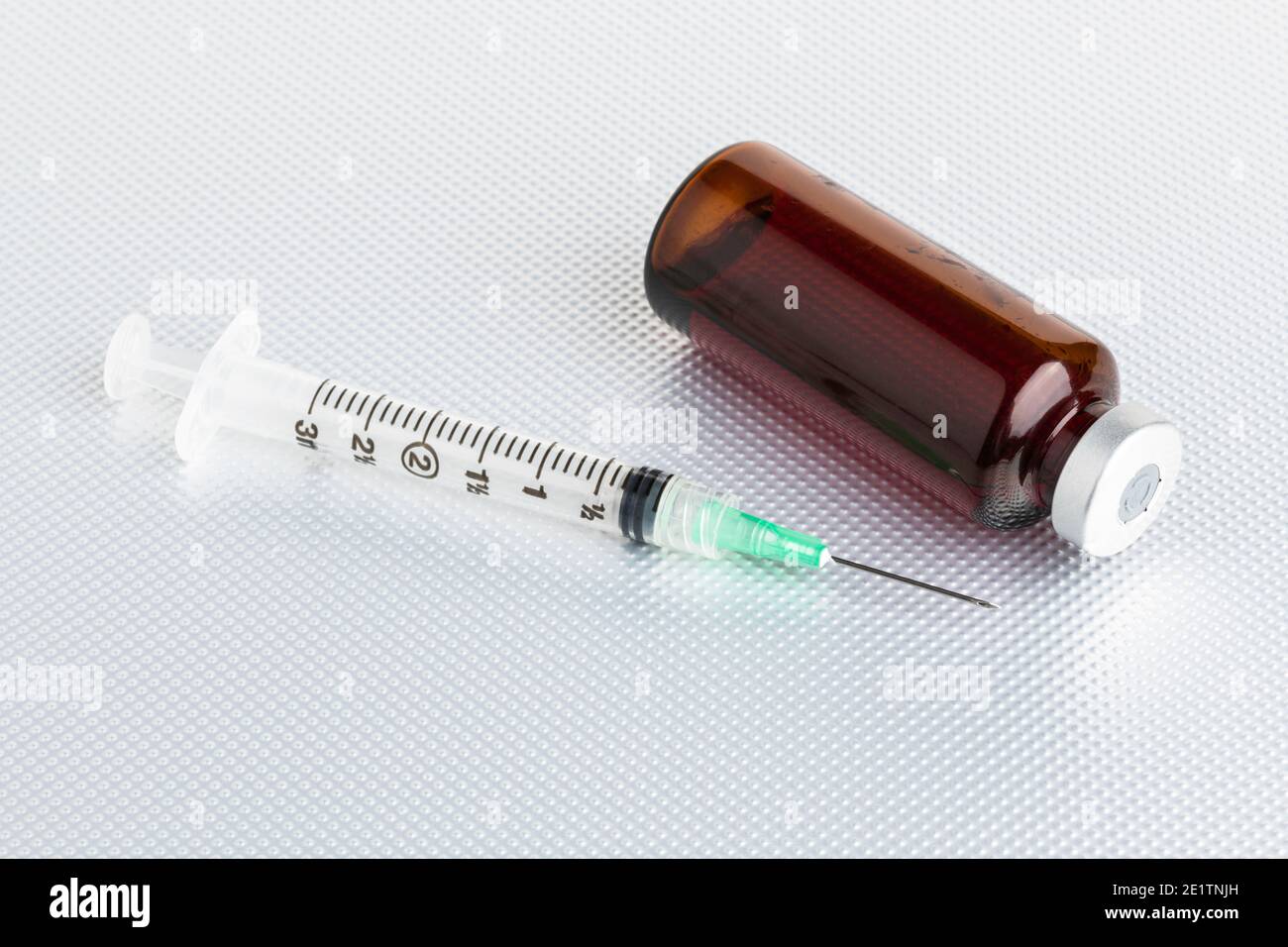 A close-up shot of a hygienic single-use plastic disposable medicine ...