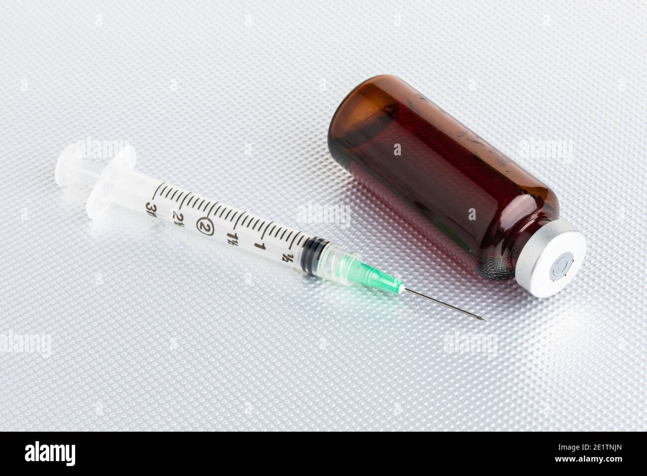 A close-up shot of a hygienic single-use plastic disposable medicine ...