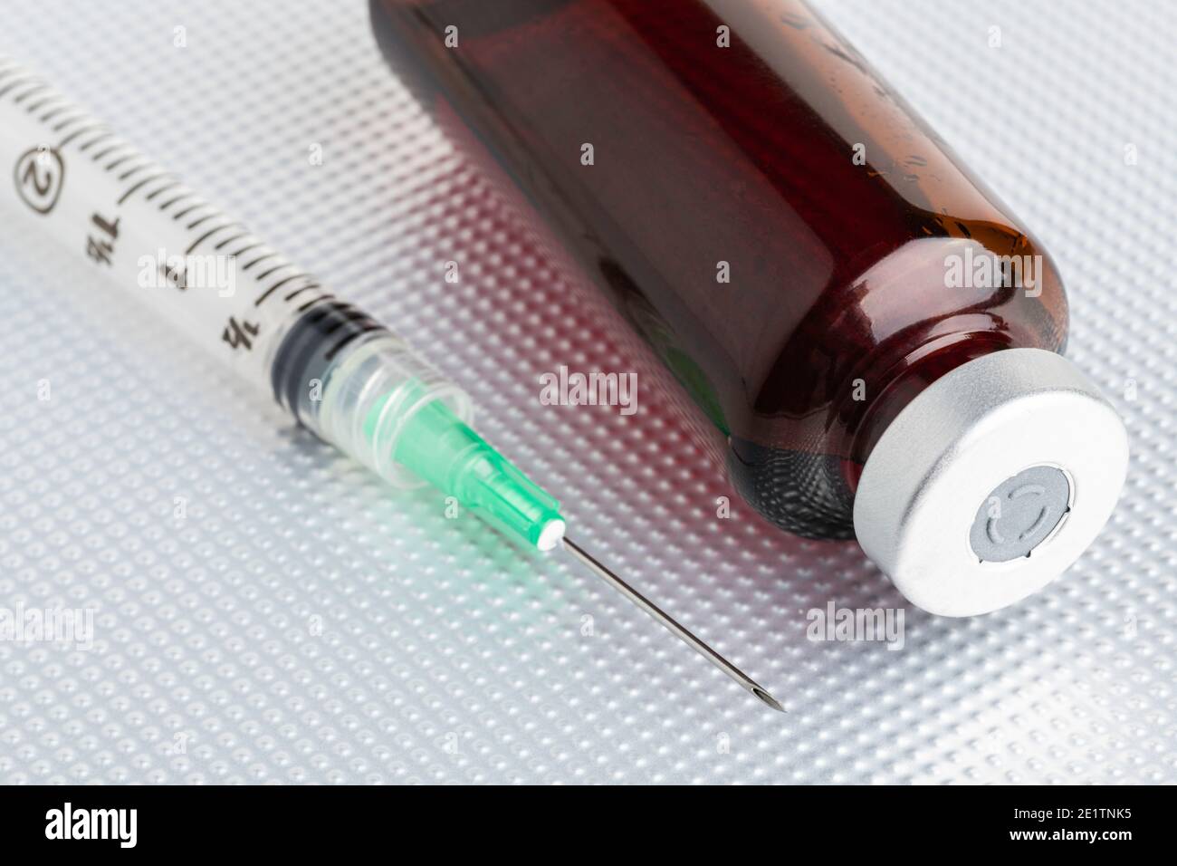 A close-up shot of a hygienic single-use plastic disposable medicine ...