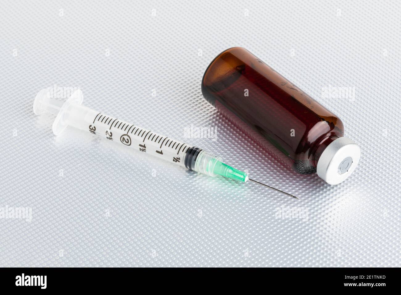 A close-up shot of a hygienic single-use plastic disposable medicine ...