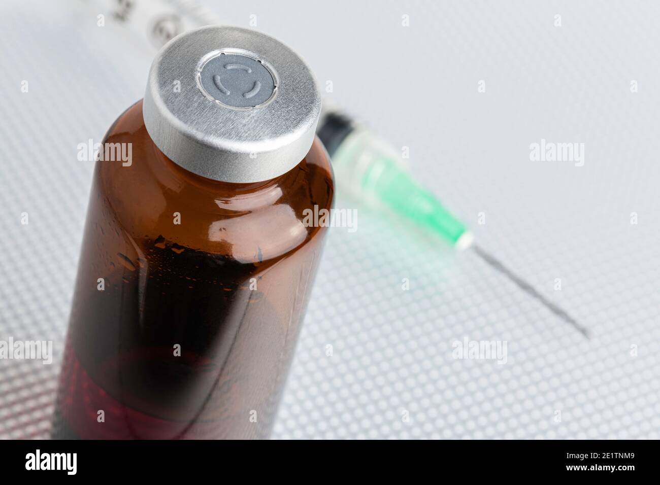 A close-up shot of a hygienic single-use plastic disposable medicine ...