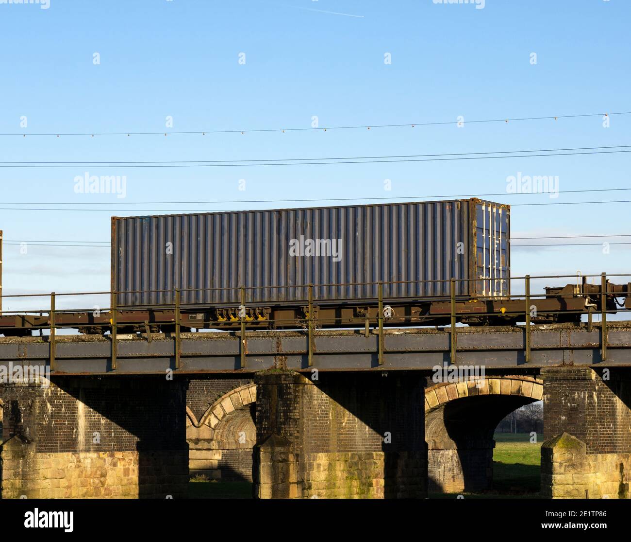 Oblong container box car on a railroad Stock Photo - Alamy