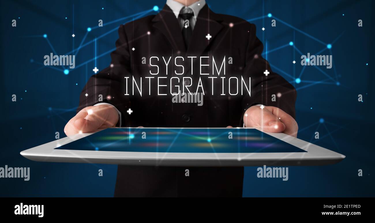 Young business person working on tablet and shows the digital sign ...