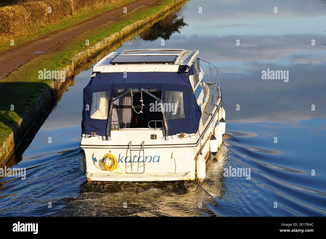 Cabin Cruiser Sailing Up A Canal Stock Photo Alamy