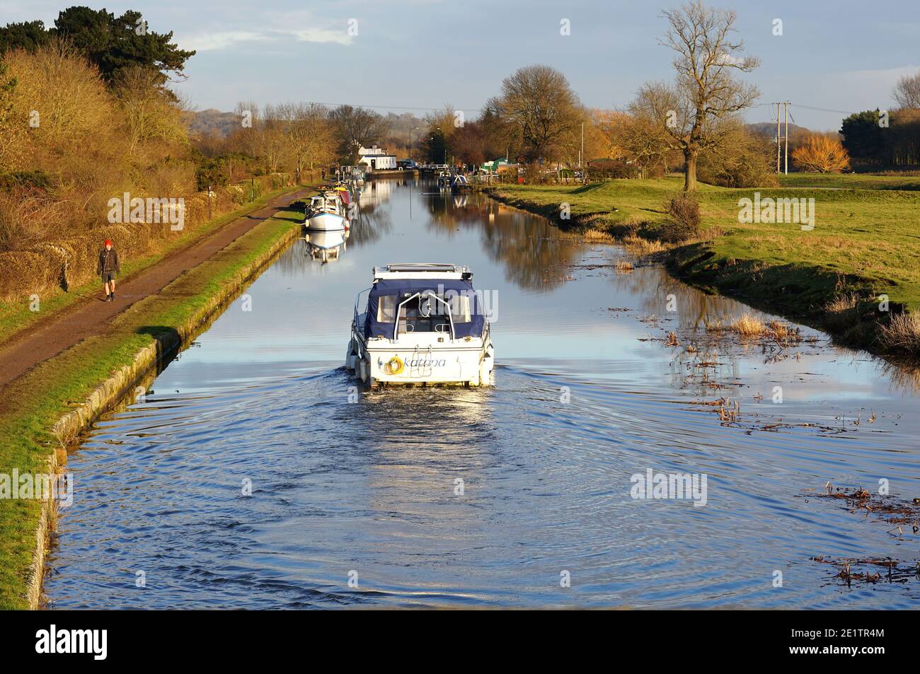 Cabin Cruiser Sailing Up A Canal Stock Photo Alamy