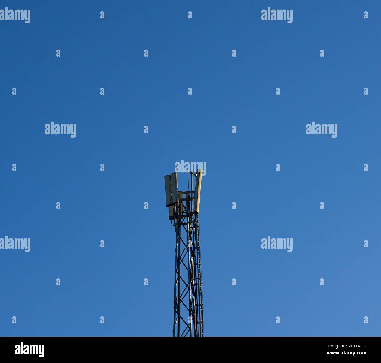Modern telecommunications mast example Stock Photo - Alamy