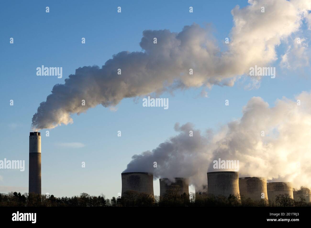 Power station towers producing steam Stock Photo - Alamy