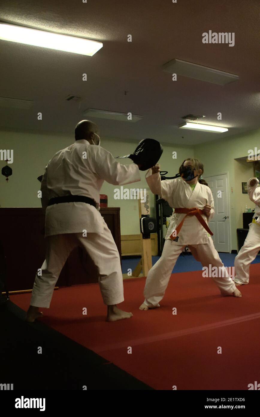 This action photo is of my daughter and her classmates in a Karate ...