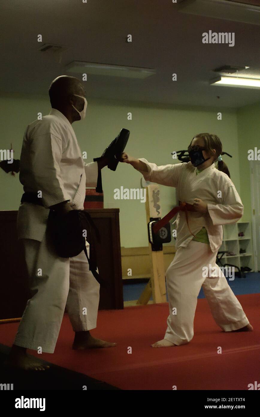 This action photo is of my daughter and her classmates in a Karate ...