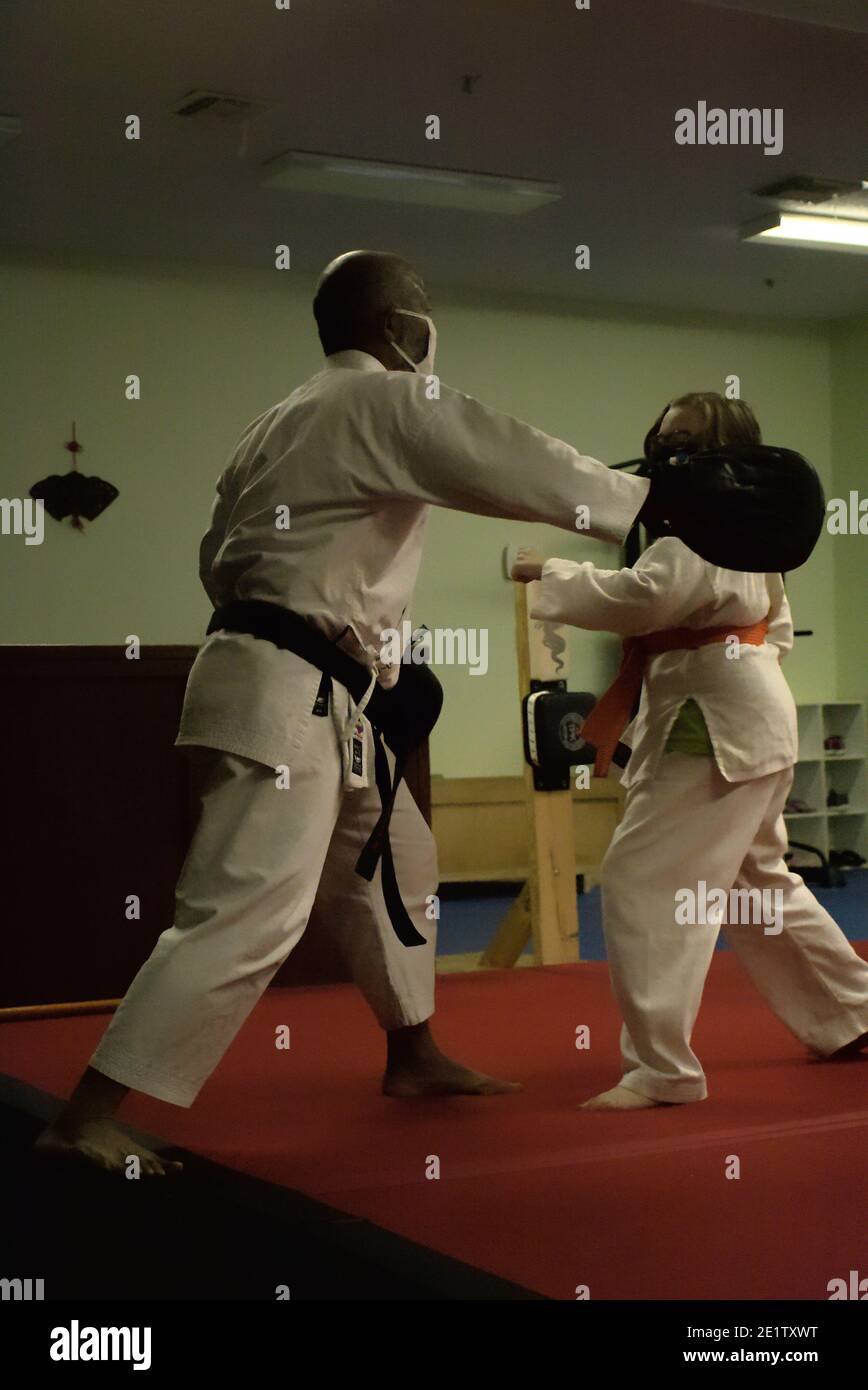 This action photo is of my daughter and her classmates in a Karate ...