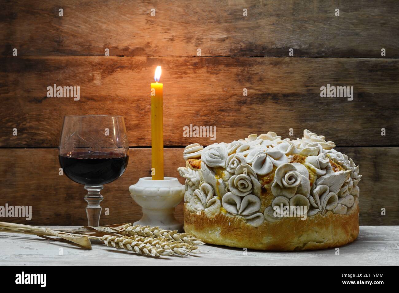 Homemade decorated Serbian slava bread with red wine Stock Photo - Alamy