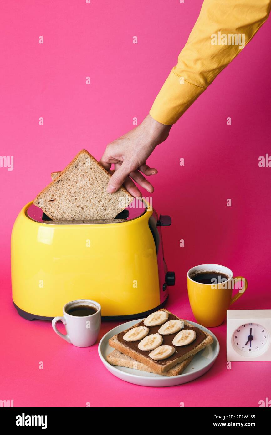 Toaster toast hands hi-res stock photography and images - Alamy
