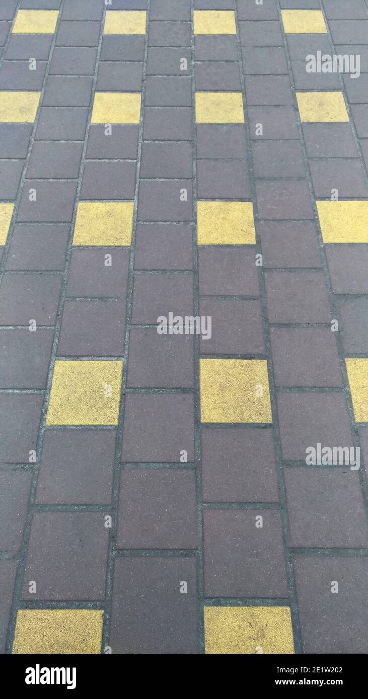 Sidewalk tiles with a pattern, covering the pedestrian area Stock Photo ...