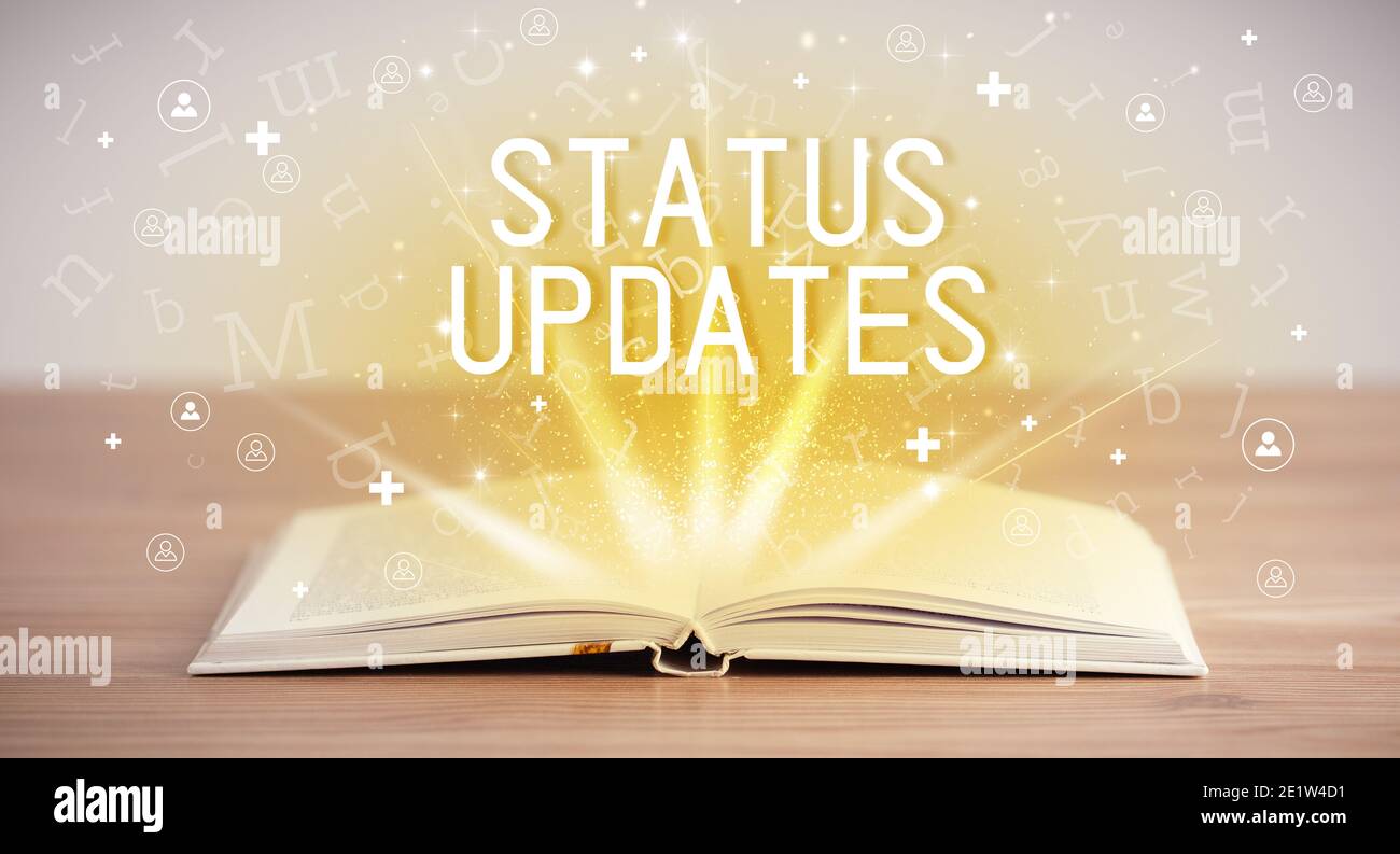 Open book with STATUS UPDATES inscription, social media concept Stock ...