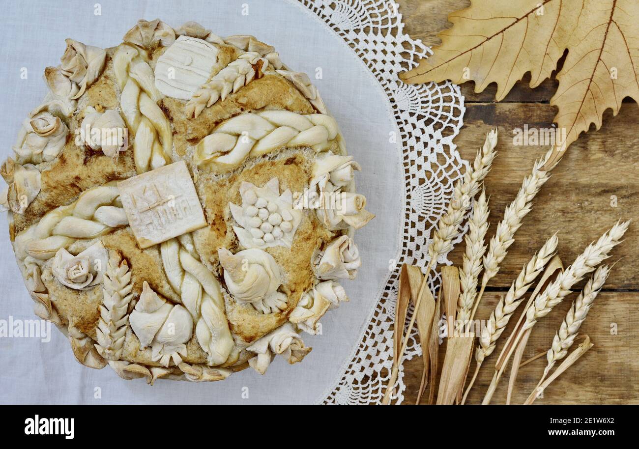 Homemade decorated Serbian slava bread on the rustic wooden board Stock ...