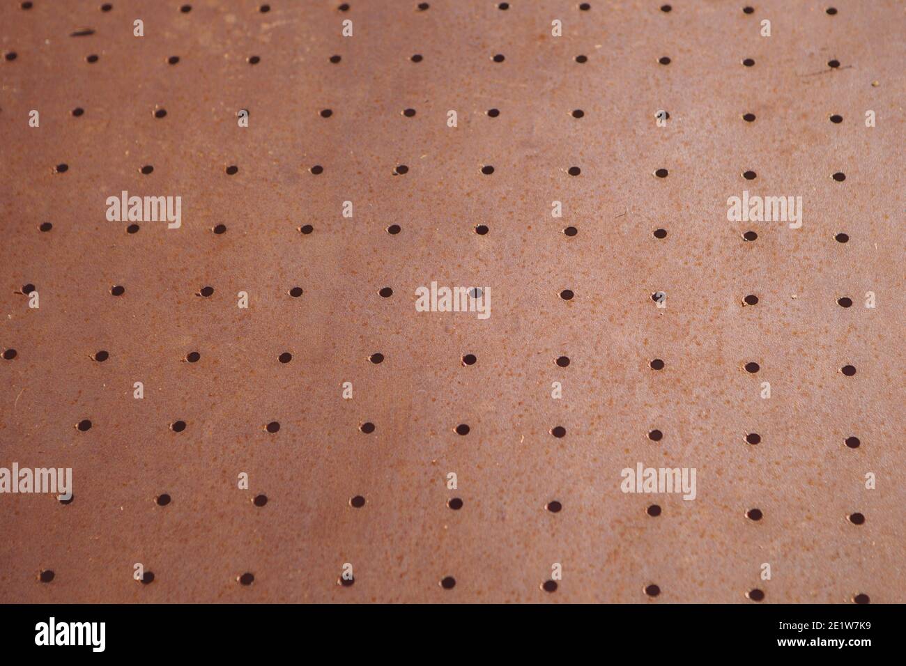 Texture of holes in rusty metal hi-res stock photography and images - Alamy