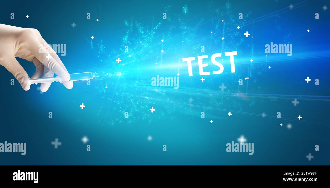 Syringe, medical injection in hand with TEST inscription, medical ...