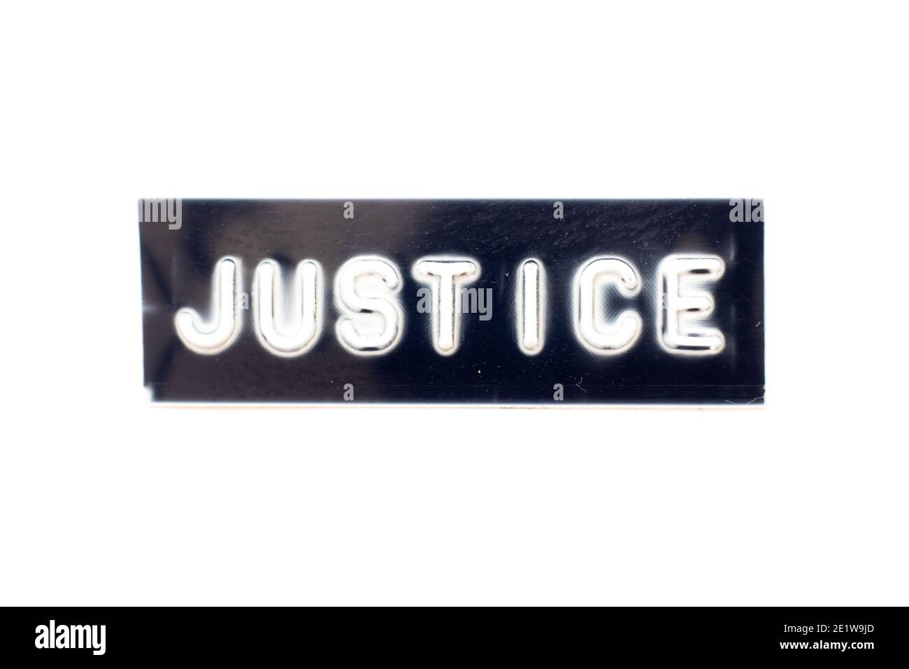 Embossed letter in word justice on black banner with white background ...