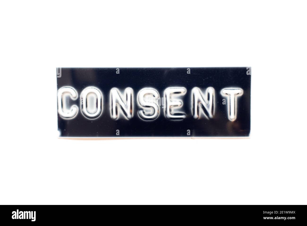 Embossed letter in word consent on black banner with white background ...