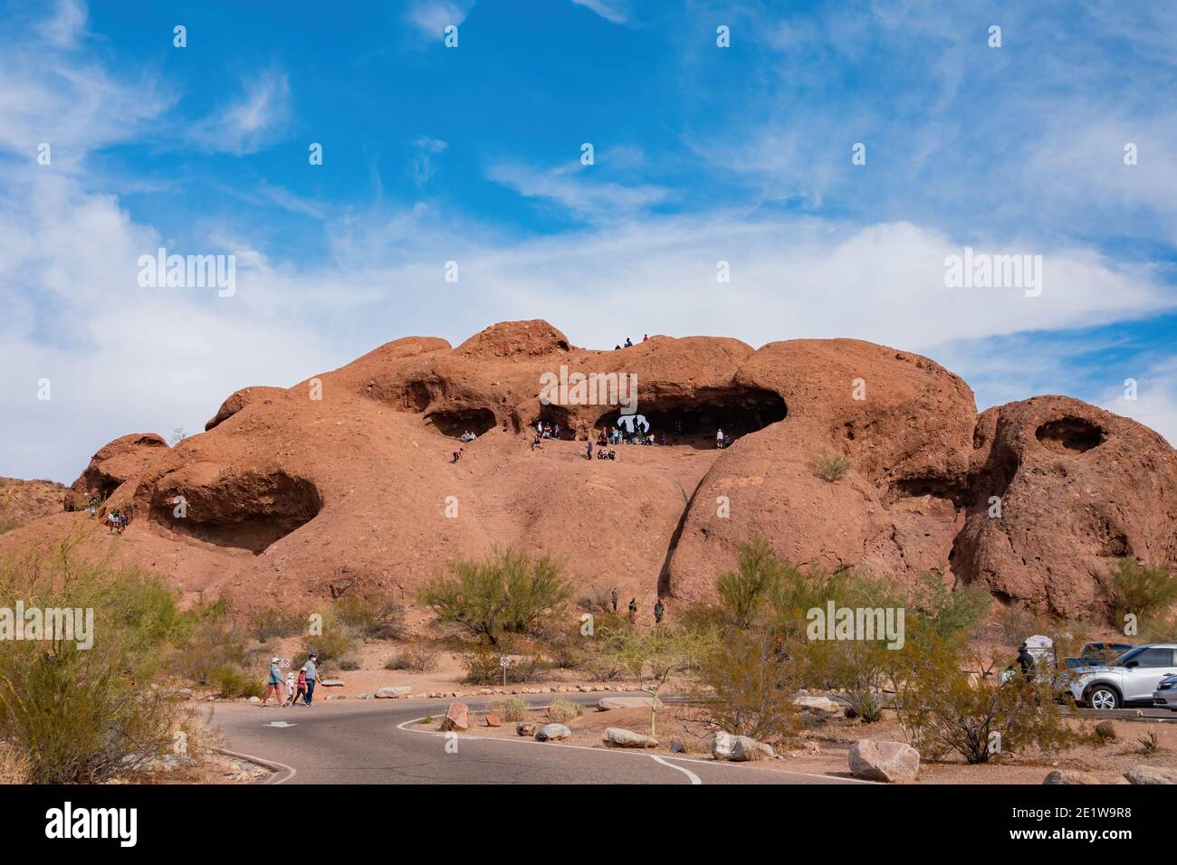 Many people hiking in the famous Hole in the Rock at Phoenix, Arizona ...