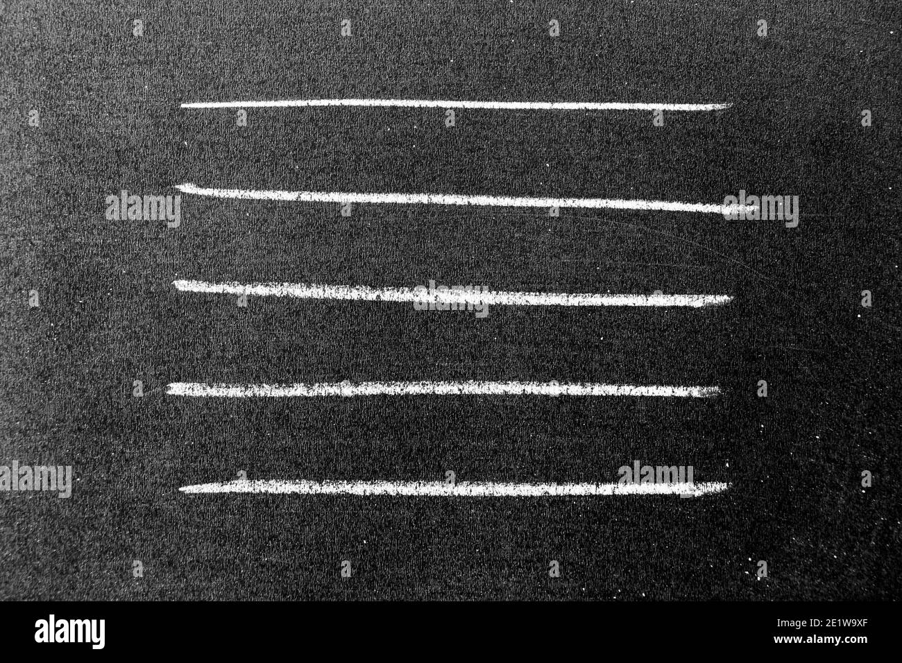 White color chalk hand drawing in set of line or square shape on black ...