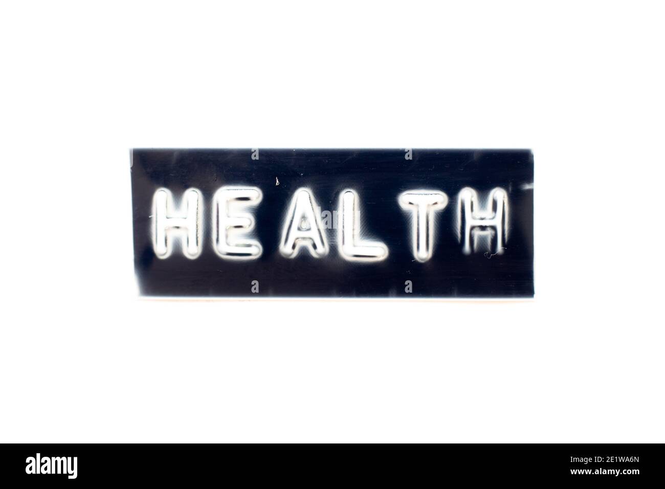 Embossed letter in word health on black banner with white background ...