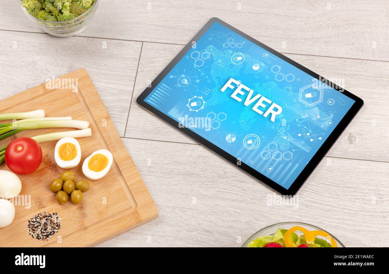 Healthy Tablet Pc compostion with FEVER inscription, immune system ...