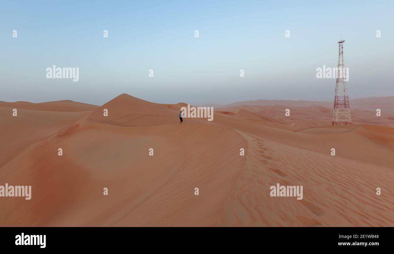 Telecommunication tower in the middle of the arabian desert Stock Photo ...