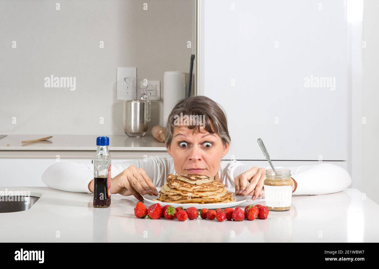 Woman and pancake and flip hi-res stock photography and images - Alamy