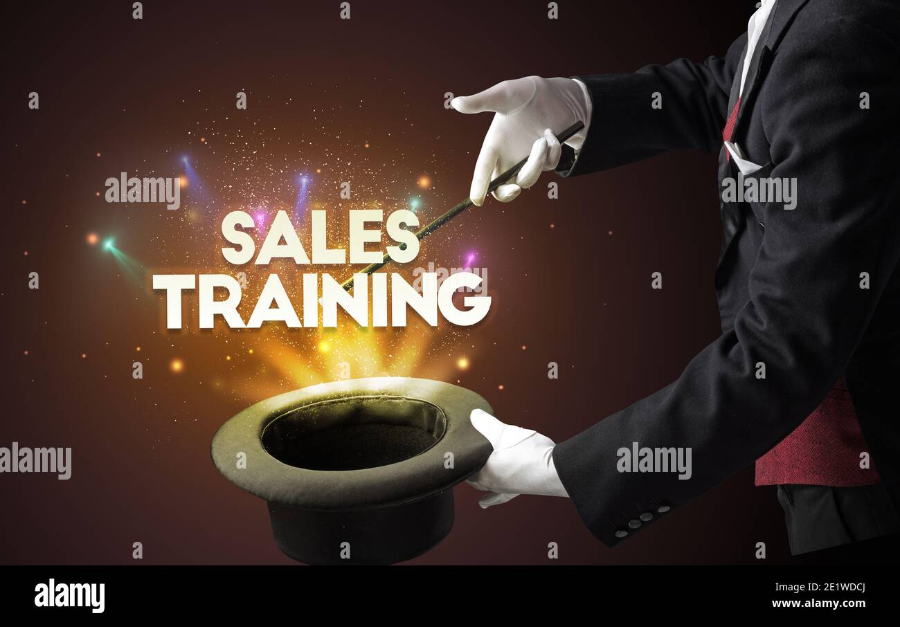 Illusionist is showing magic trick with SALES TRAINING inscription, new ...